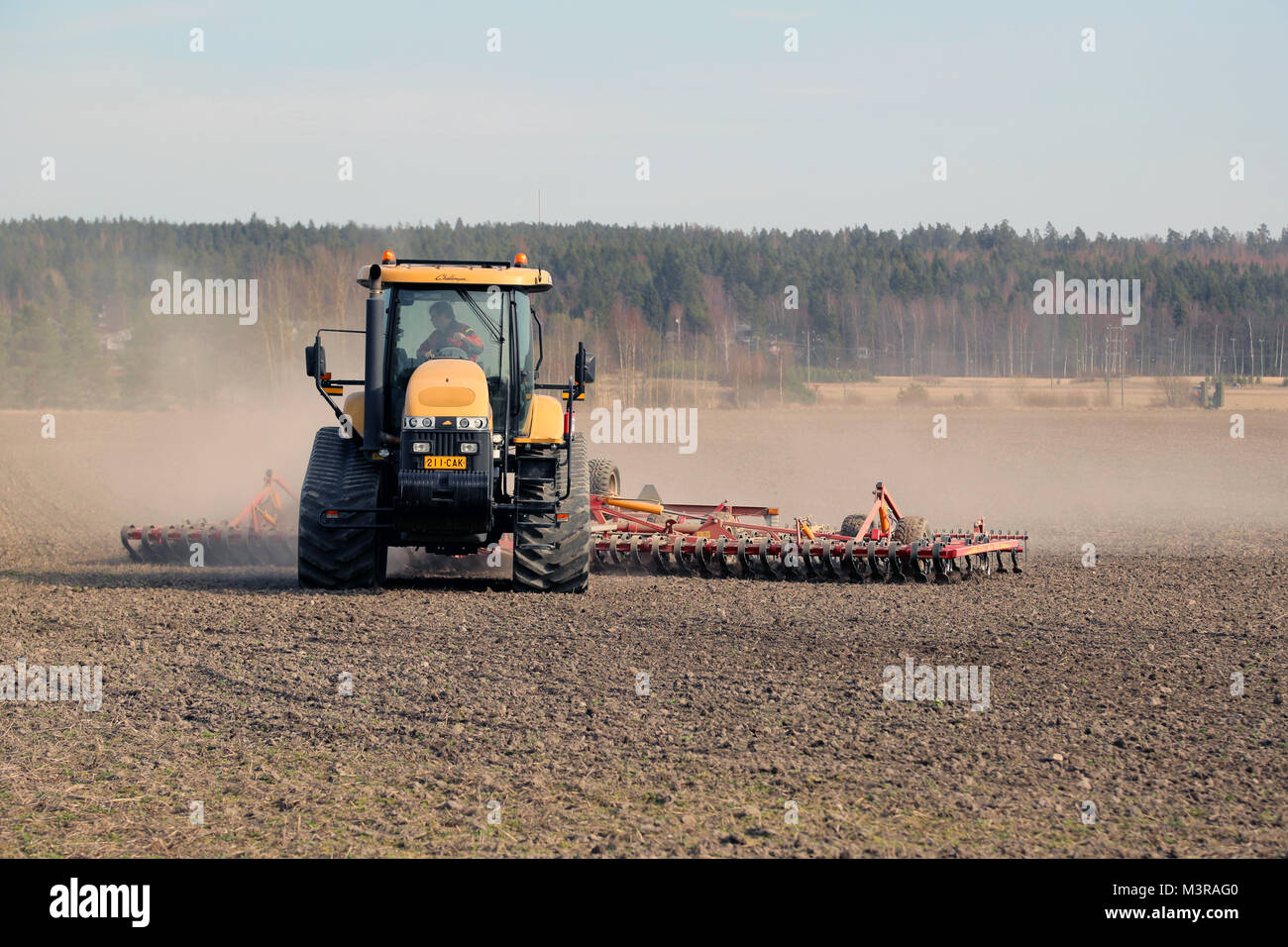 Crawler tractor cultivating field hi-res stock photography and images ...
