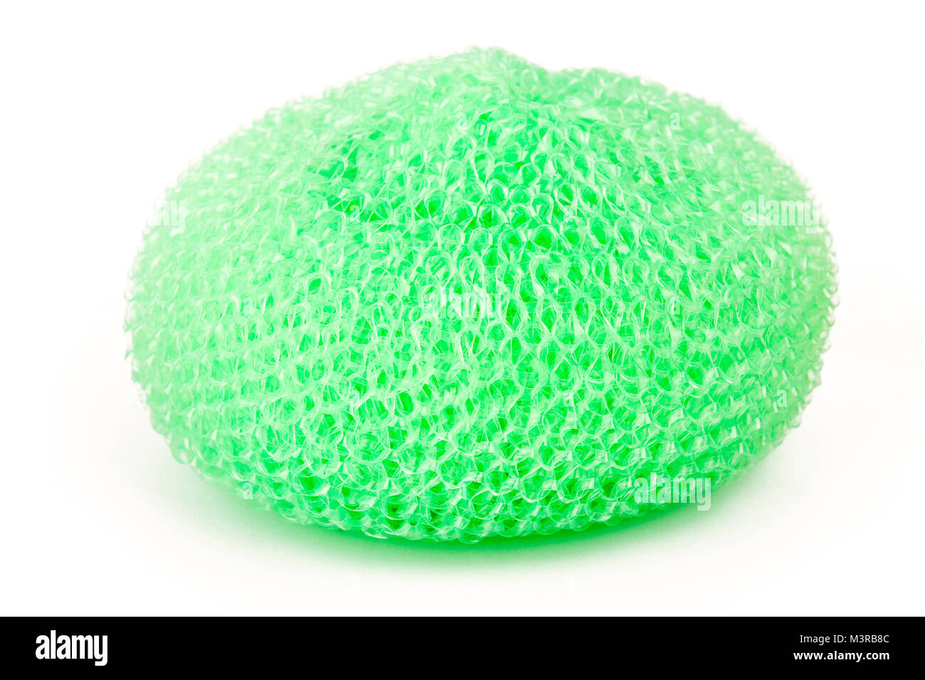 Green vibrant plastic scourer isolated on white background Stock Photo ...