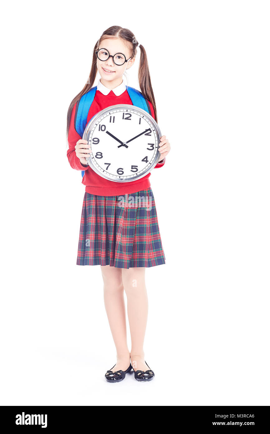 School girl holding clock Stock Photo - Alamy