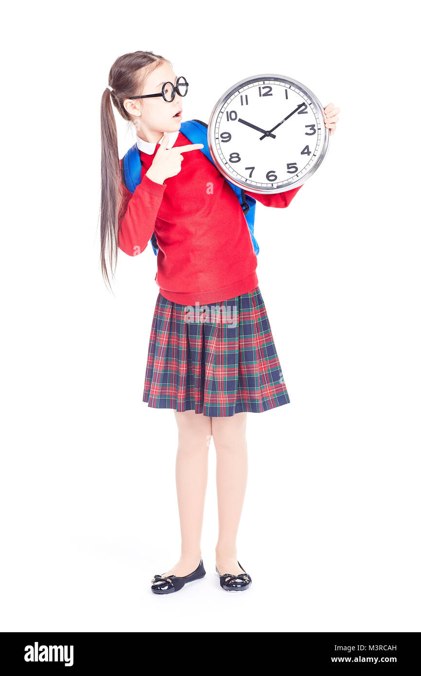 School girl holding clock Stock Photo - Alamy