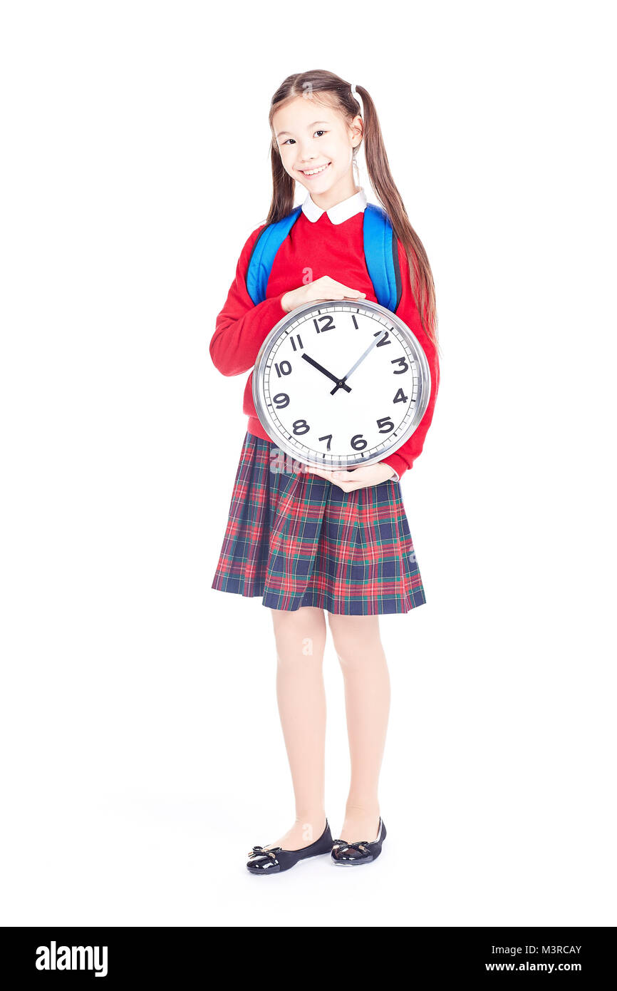 School girl holding clock Stock Photo - Alamy