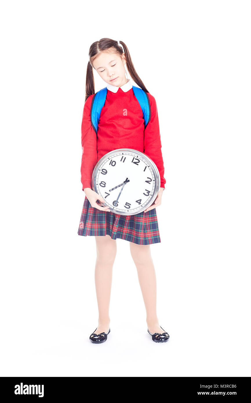 School girl holding clock Stock Photo - Alamy