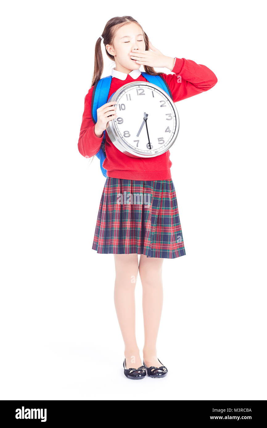 School girl holding clock Stock Photo - Alamy