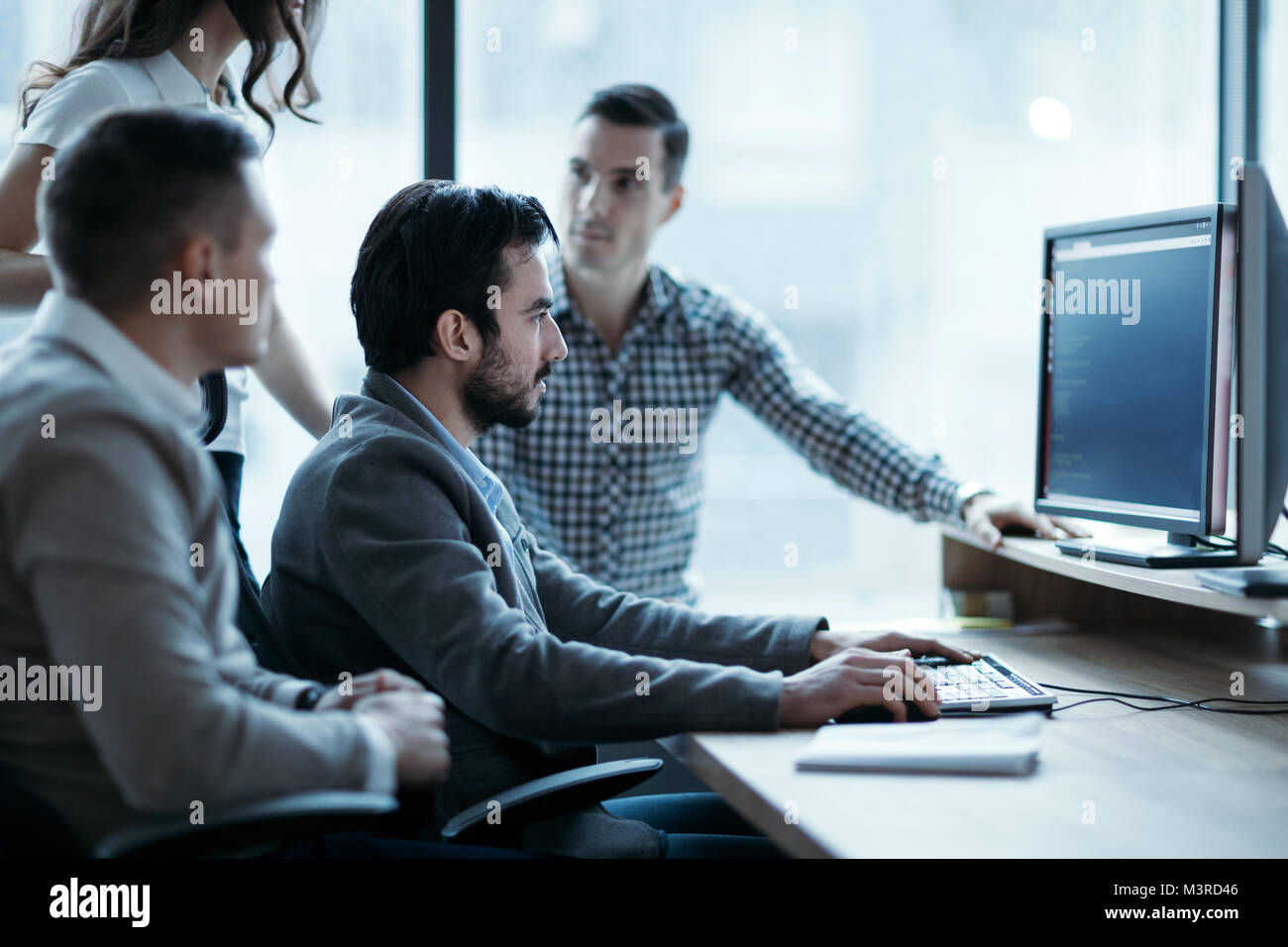 Picture of business people working together in office Stock Photo - Alamy