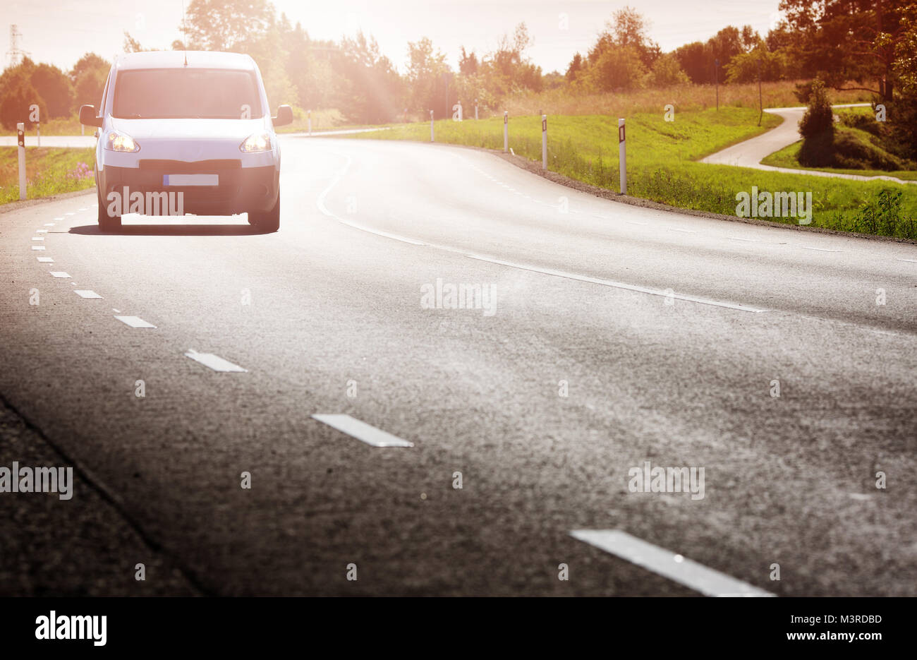 Road panorama on sunny spring evening Stock Photo - Alamy