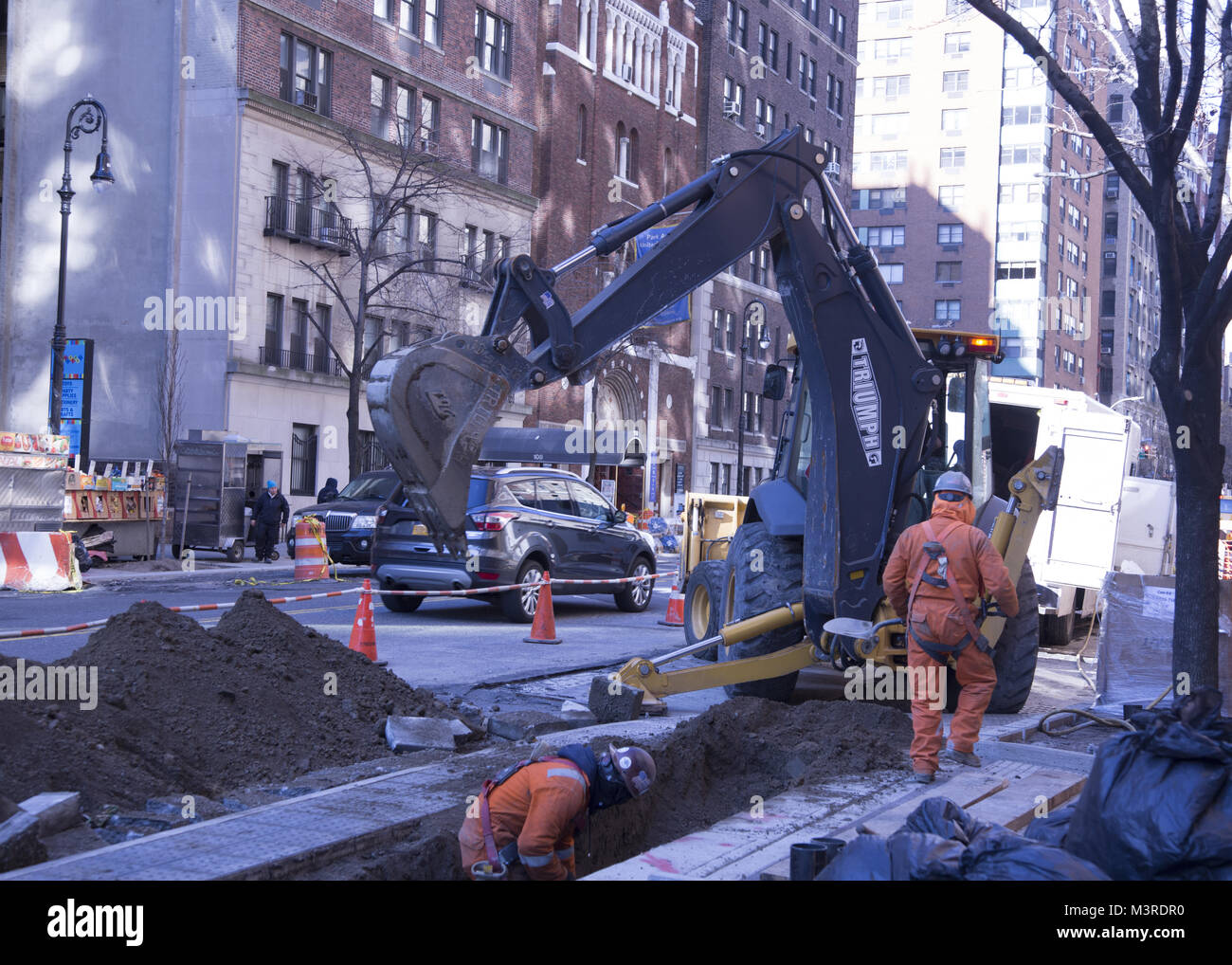 Backhoe City Street High Resolution Stock Photography and Images - Alamy