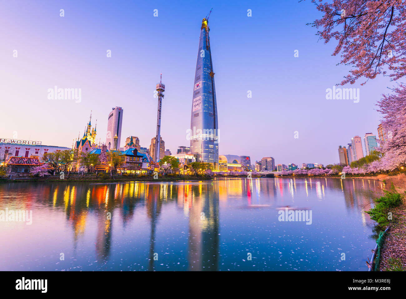 SEOUL, KOREA - APRIL 7, 2016: Lotte World Seokchon Lake park at night ...