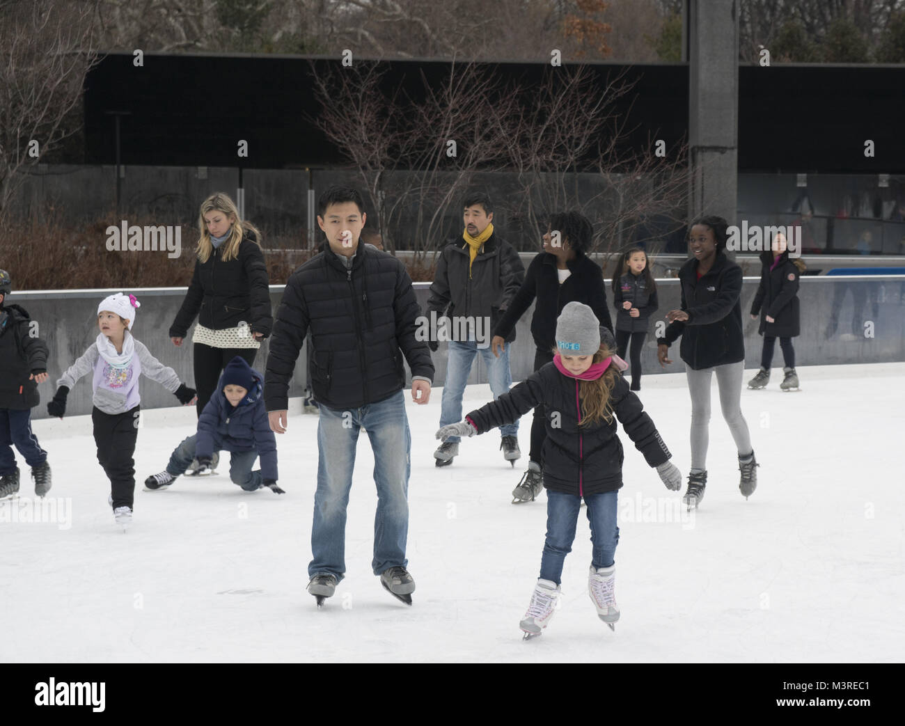 People of various cultures and ethnicities ice skate at LeFrak Center ...