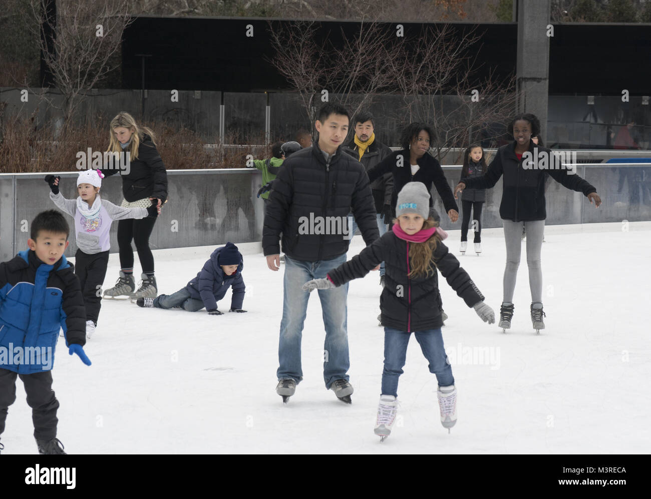 People of various cultures and ethnicities ice skate at LeFrak Center ...