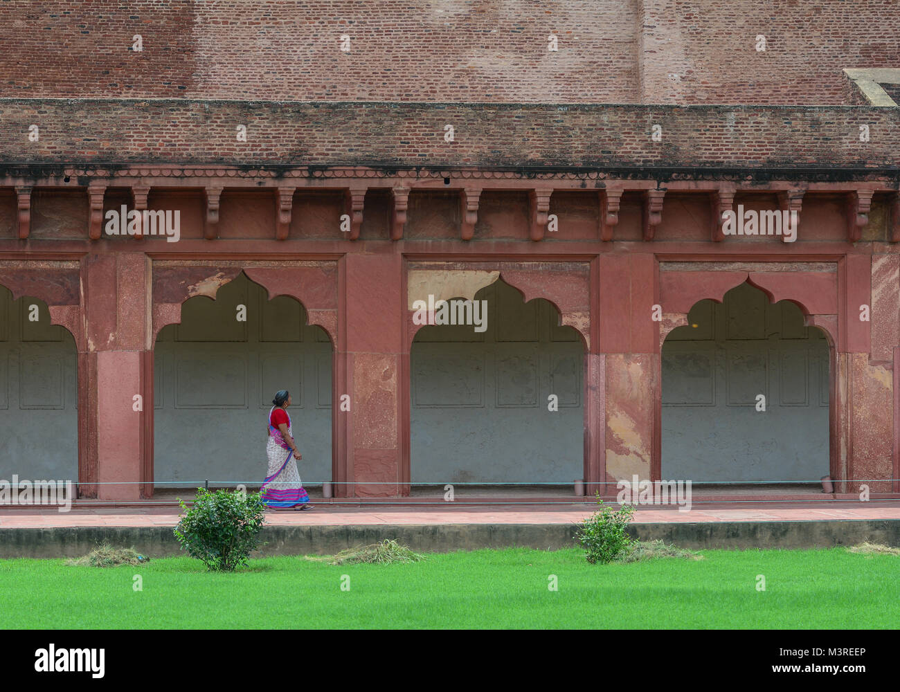 Agra, India - Jul 13, 2015. A woman in traditional dress (saree ...