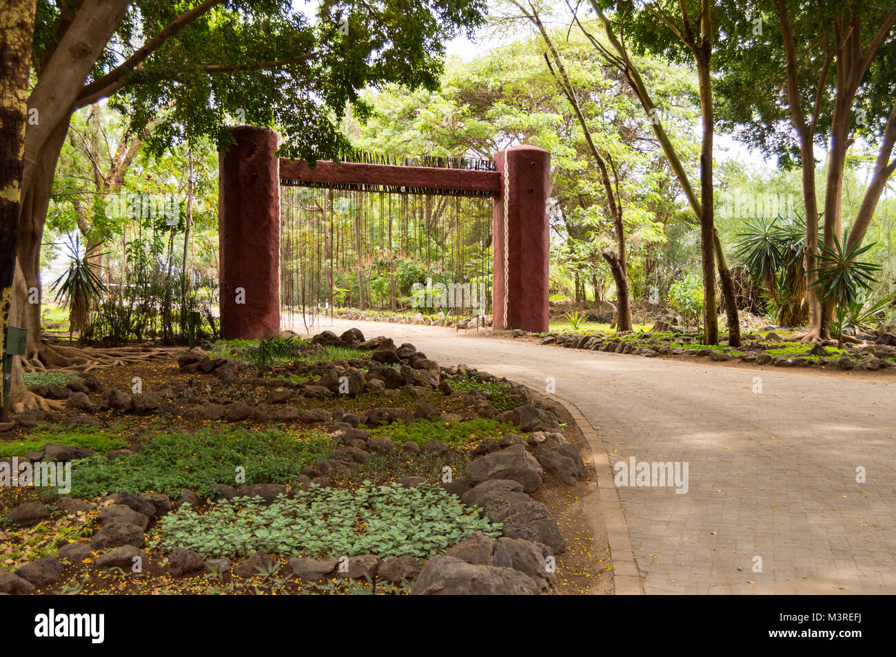 Security gantry with anti-animal ropes on access road in the Amboseli ...