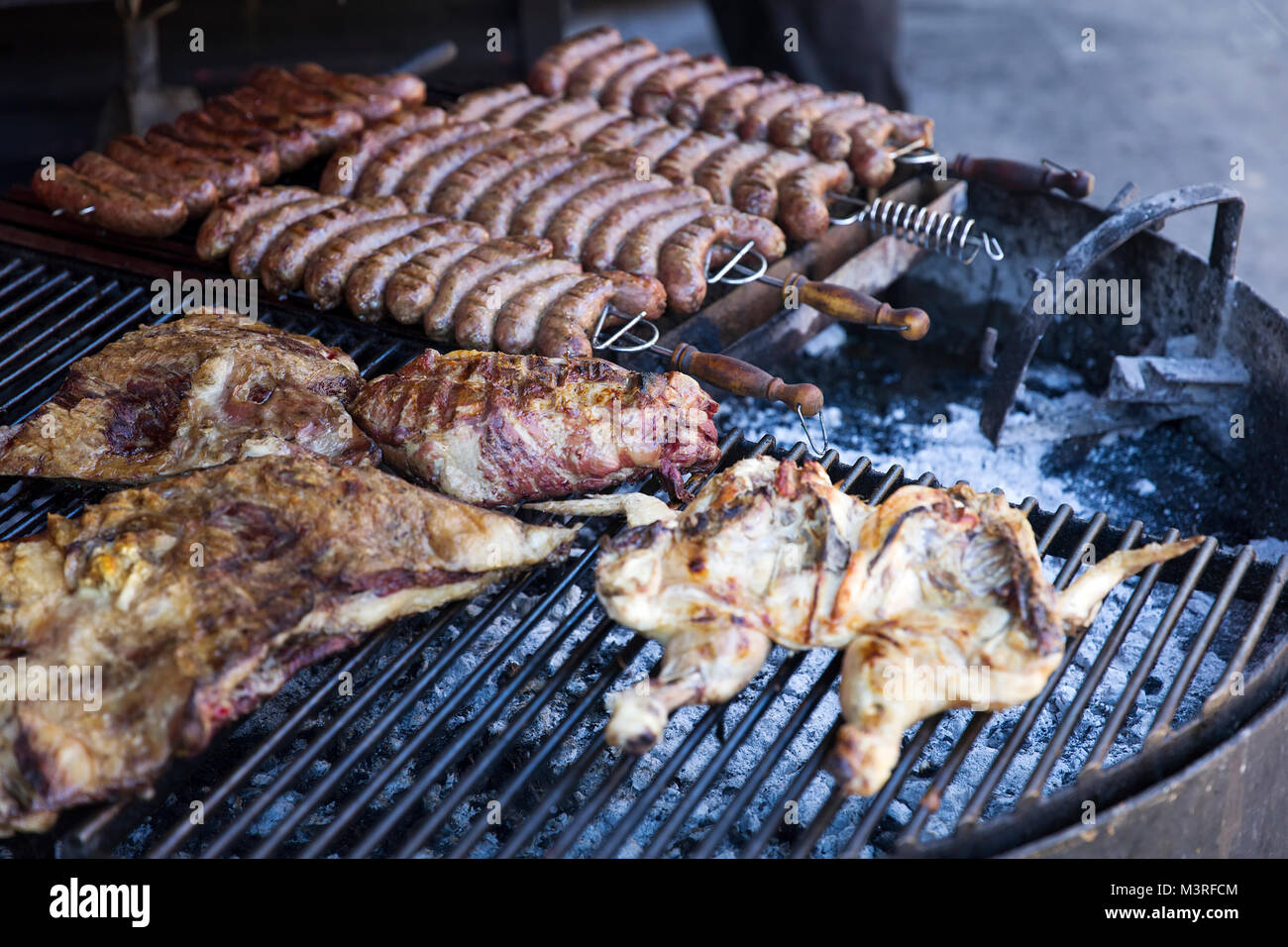 Close up view at roasted meat cooked on an outdoor grill Stock Photo ...