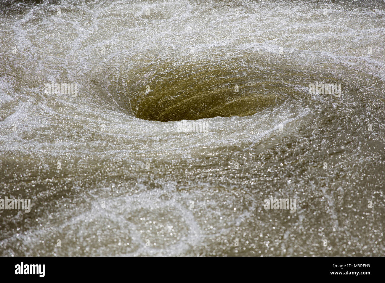 Large whirlpool in the center of a river Stock Photo - Alamy