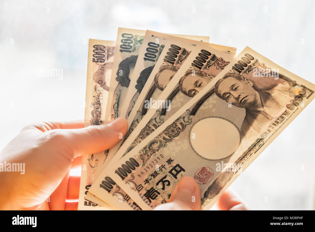 Japan money yen banknotes Stock Photo - Alamy