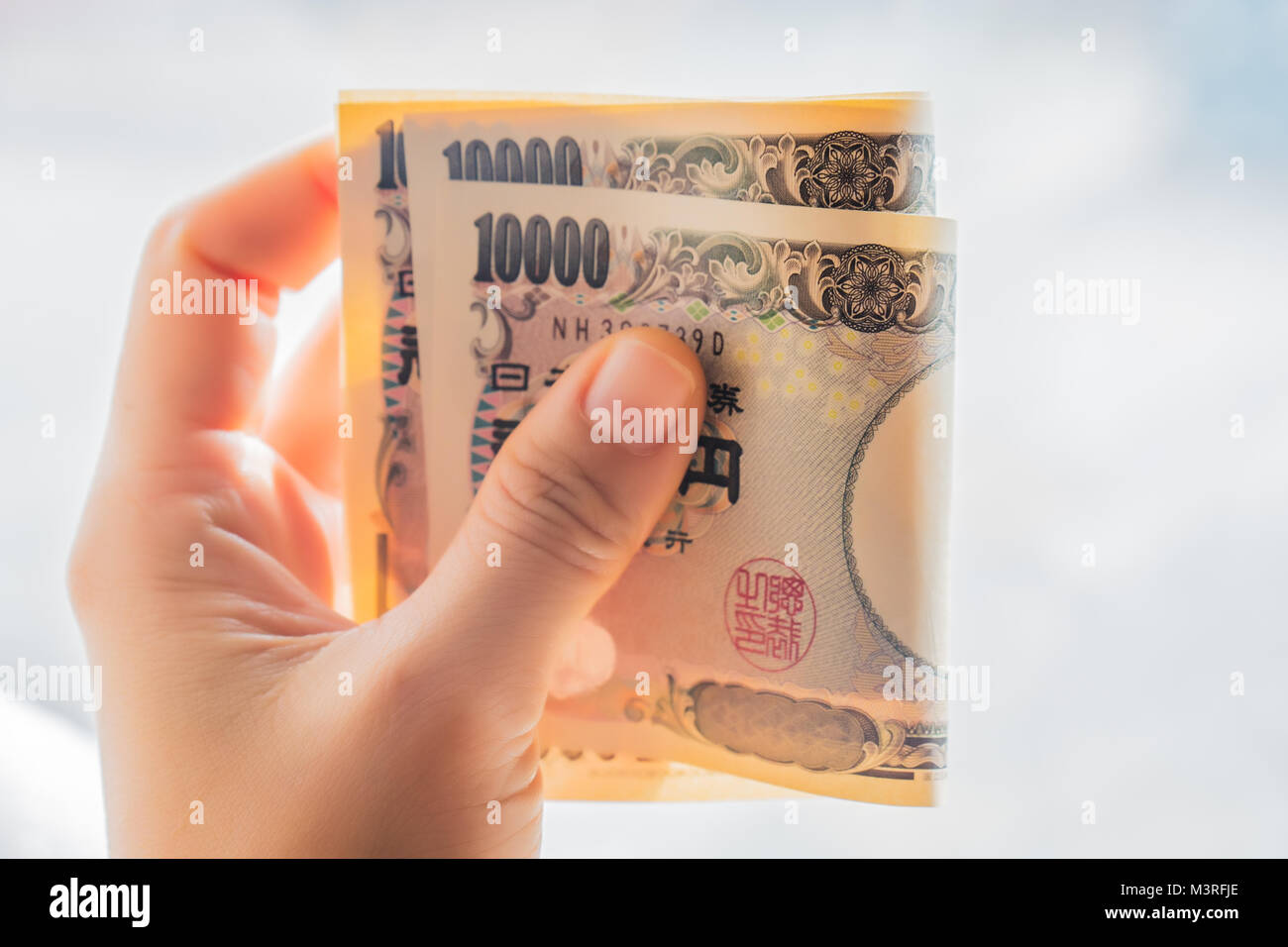 Japan money yen banknotes Stock Photo - Alamy