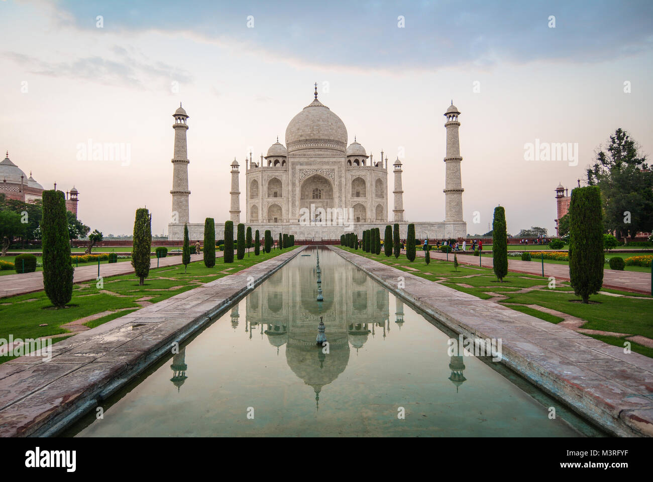 View of Taj Mahal at sunset in Agra, India. The Taj Mahal attracts 7-8 ...