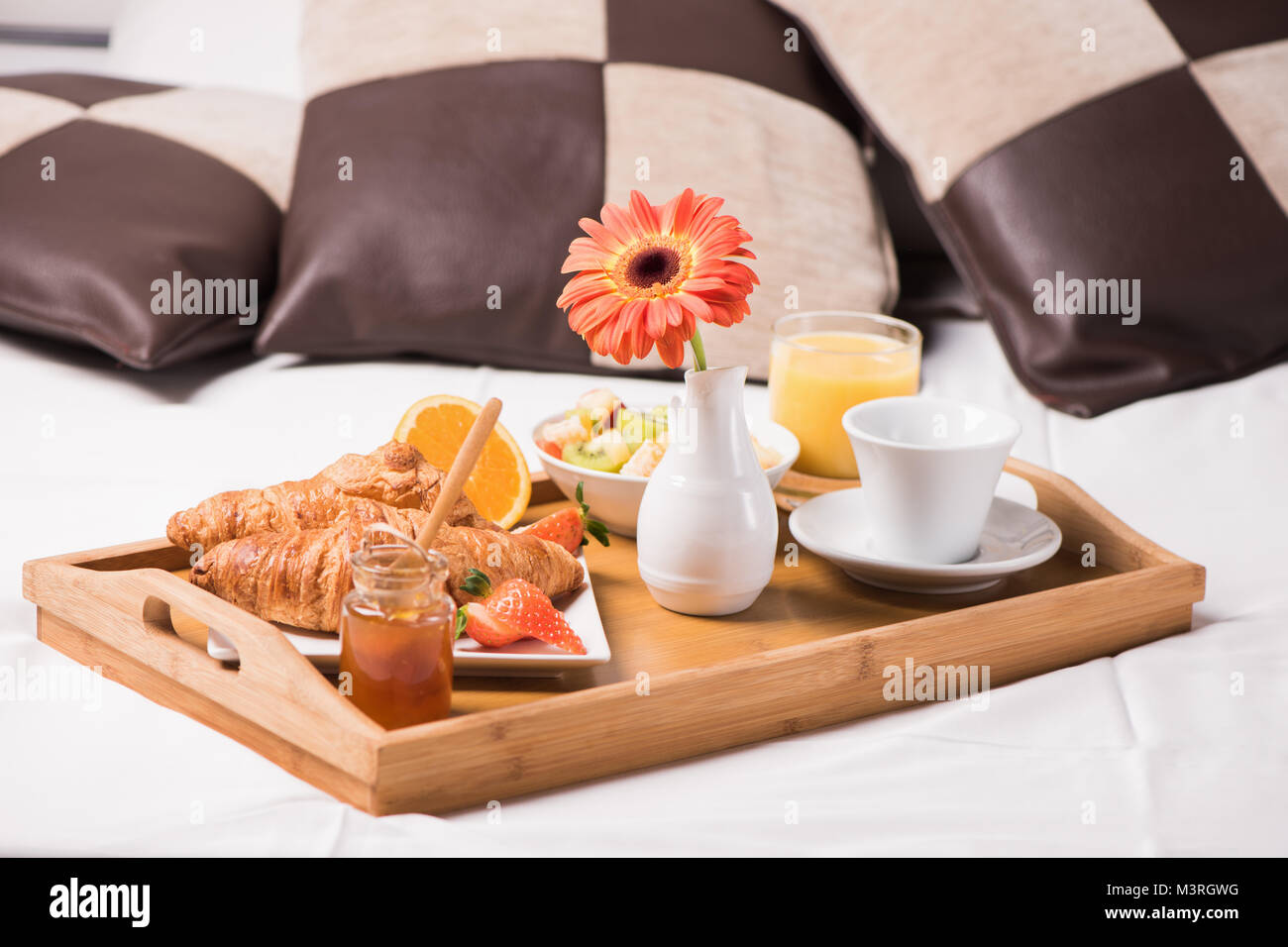Tray with breakfast food on the bed inside a bedroom Stock Photo - Alamy