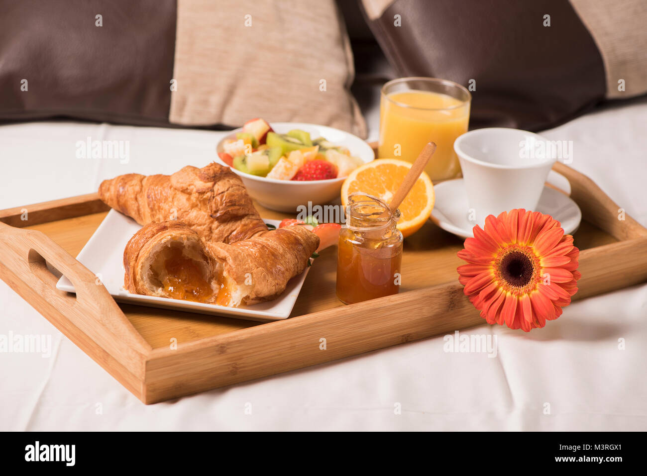 Tray with breakfast food on the bed inside a bedroom Stock Photo - Alamy