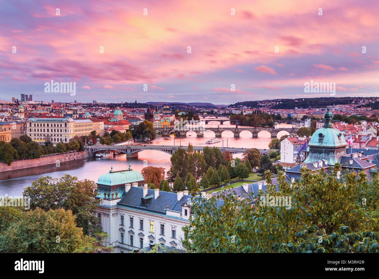 Scenic view of bridges on the Vltava river and historical center of ...