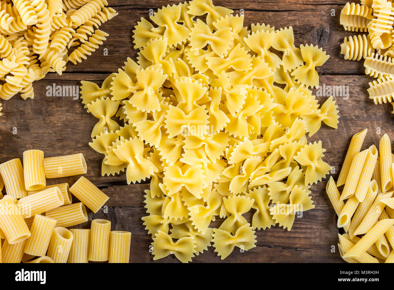 Different Types of Raw Pastas such as Fusilli, Penne Rigate, Radiatori ...