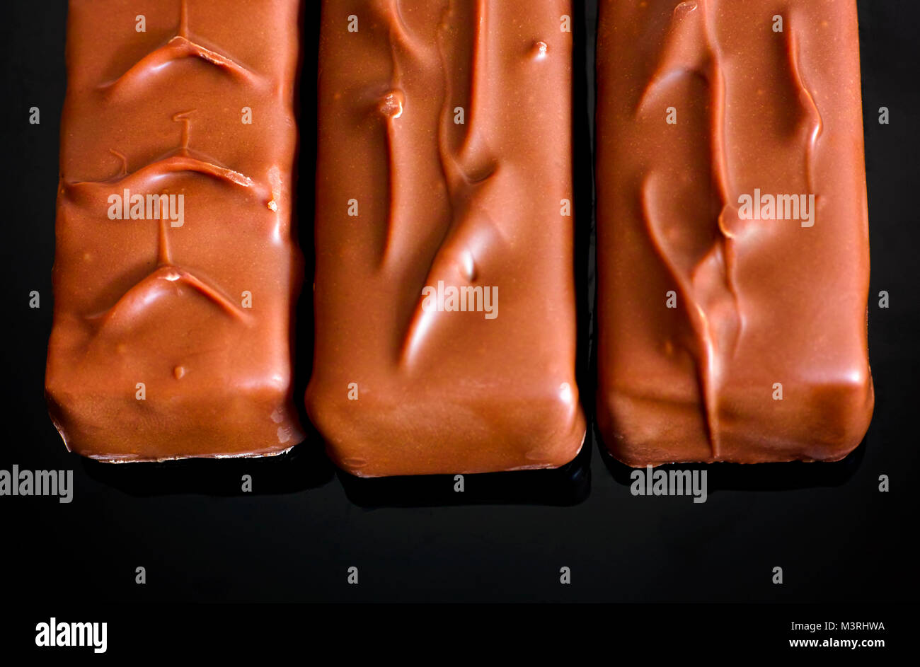 Row chocolate bars in hi-res stock photography and images - Alamy
