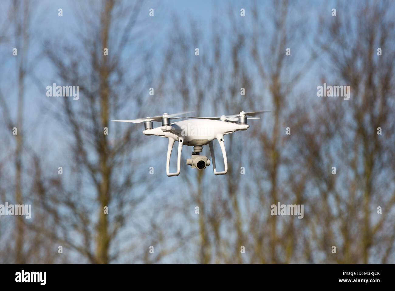 DJI Phantom 4 Pro drone flying Stock Photo - Alamy