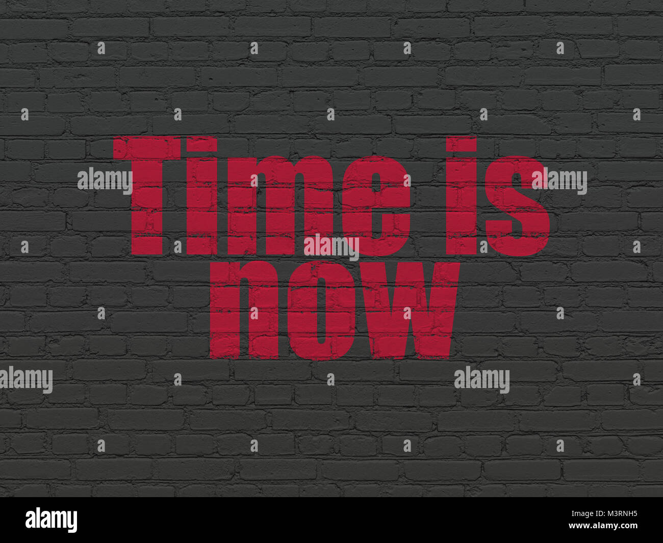 Time concept: Time is Now on wall background Stock Photo - Alamy