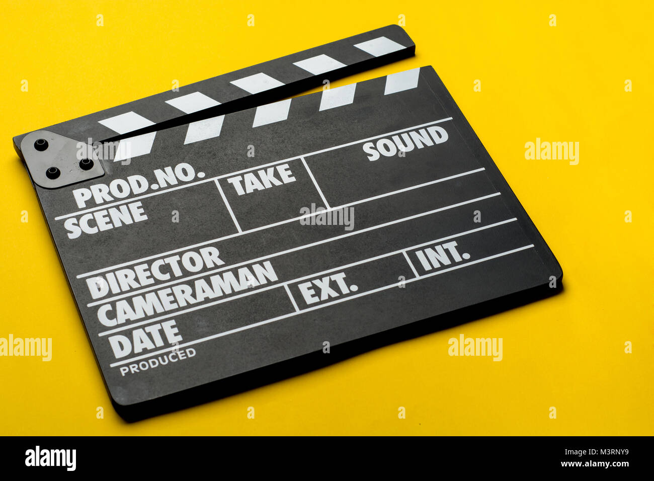 movie clapper on yellow background, cinema concept Stock Photo - Alamy