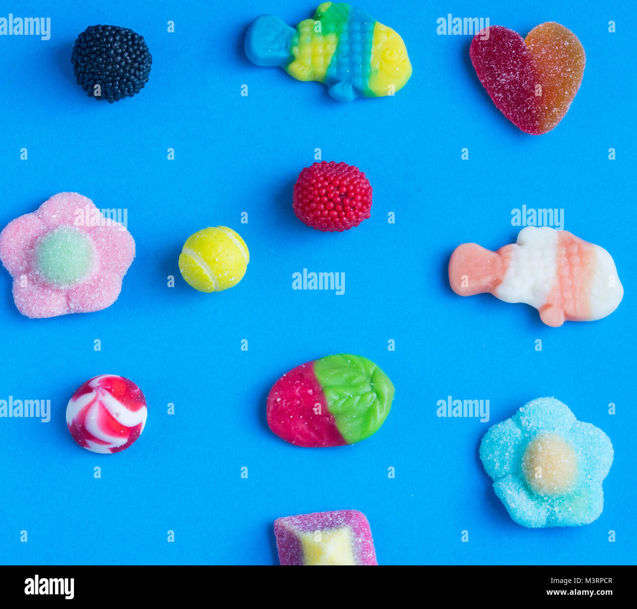 Gummy candies on blue hi-res stock photography and images - Alamy
