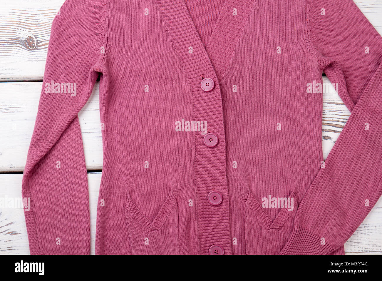 Cardigan sweater buttons hi-res stock photography and images - Alamy