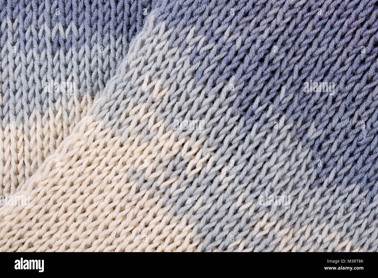 Blue knitting background of handmade woolen pattern Stock Photo - Alamy