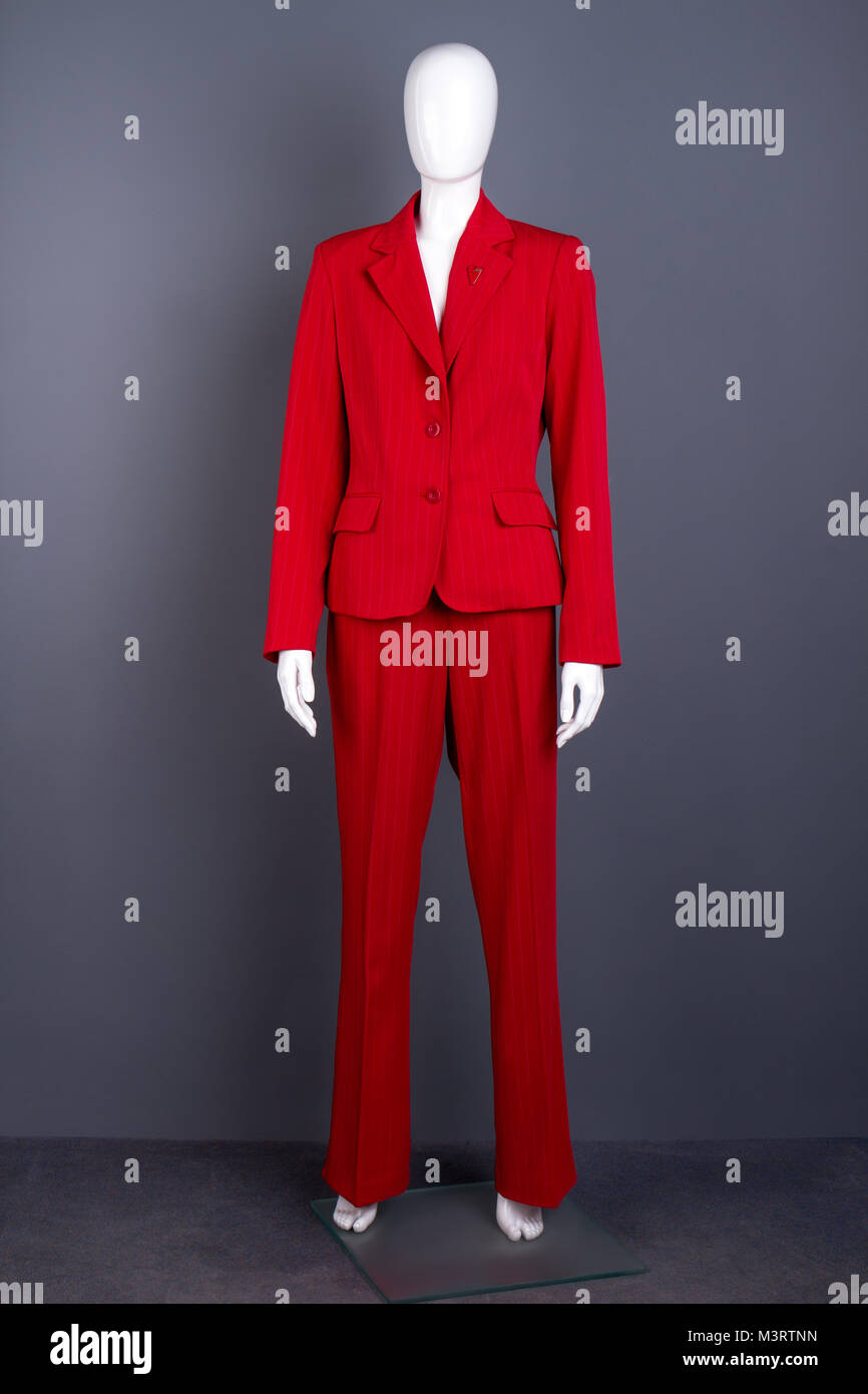 Mannequin in female red elegant suit Stock Photo - Alamy