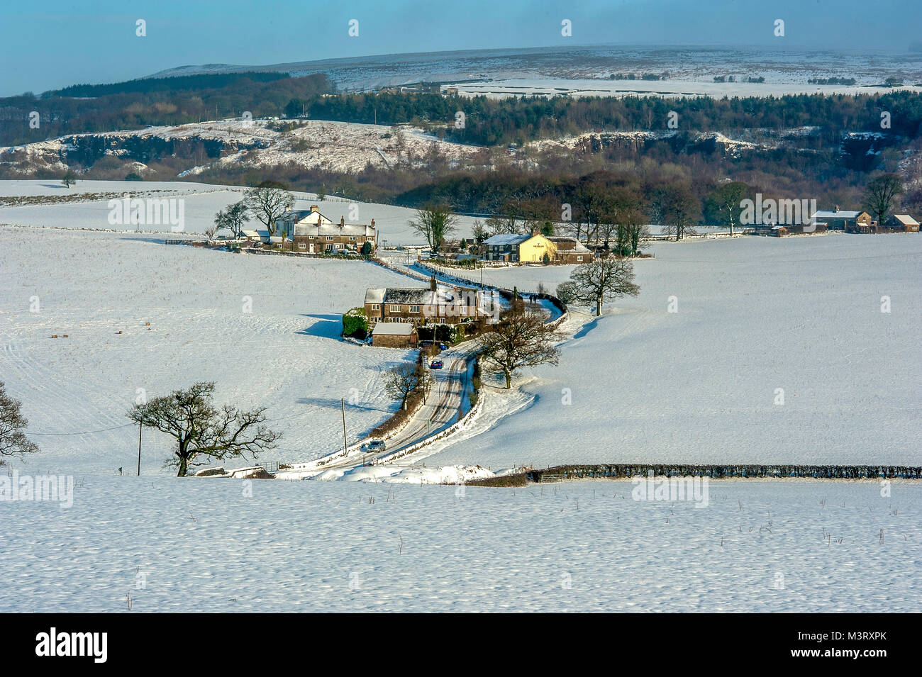Winter scene The view of the Lancashire countryside showing cottages at ...