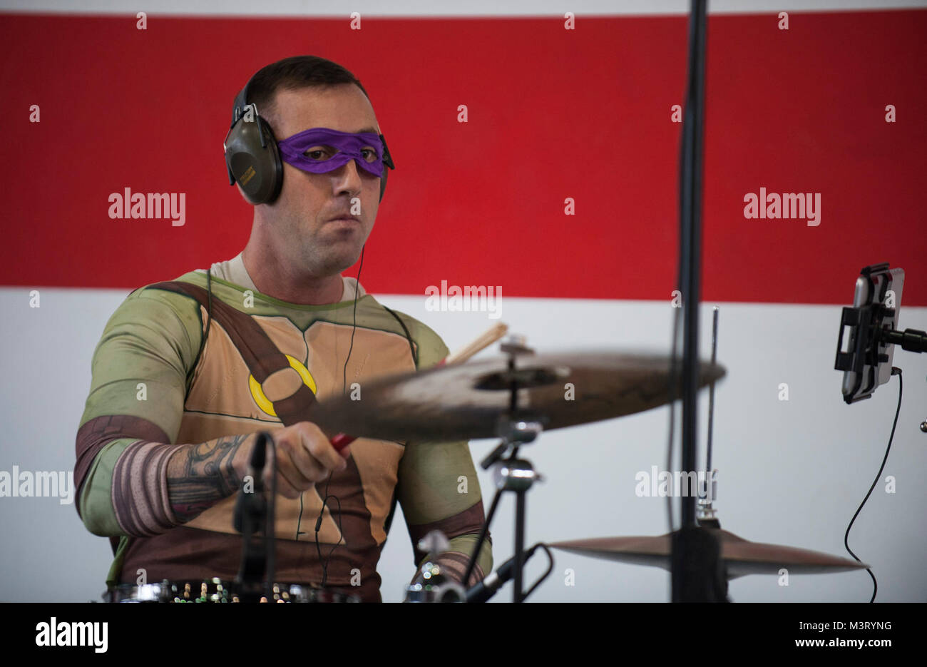 U.S. Army Sgt. 1st Class Ryan Malin, a drummer with the U.S. Army ...