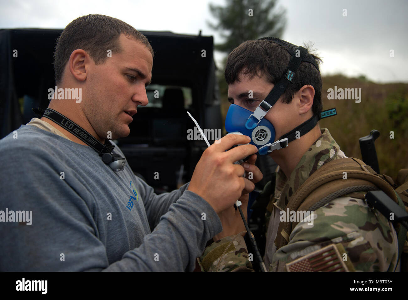 University of Pittsburgh researcher Andrew Simonson attaches a maximal ...
