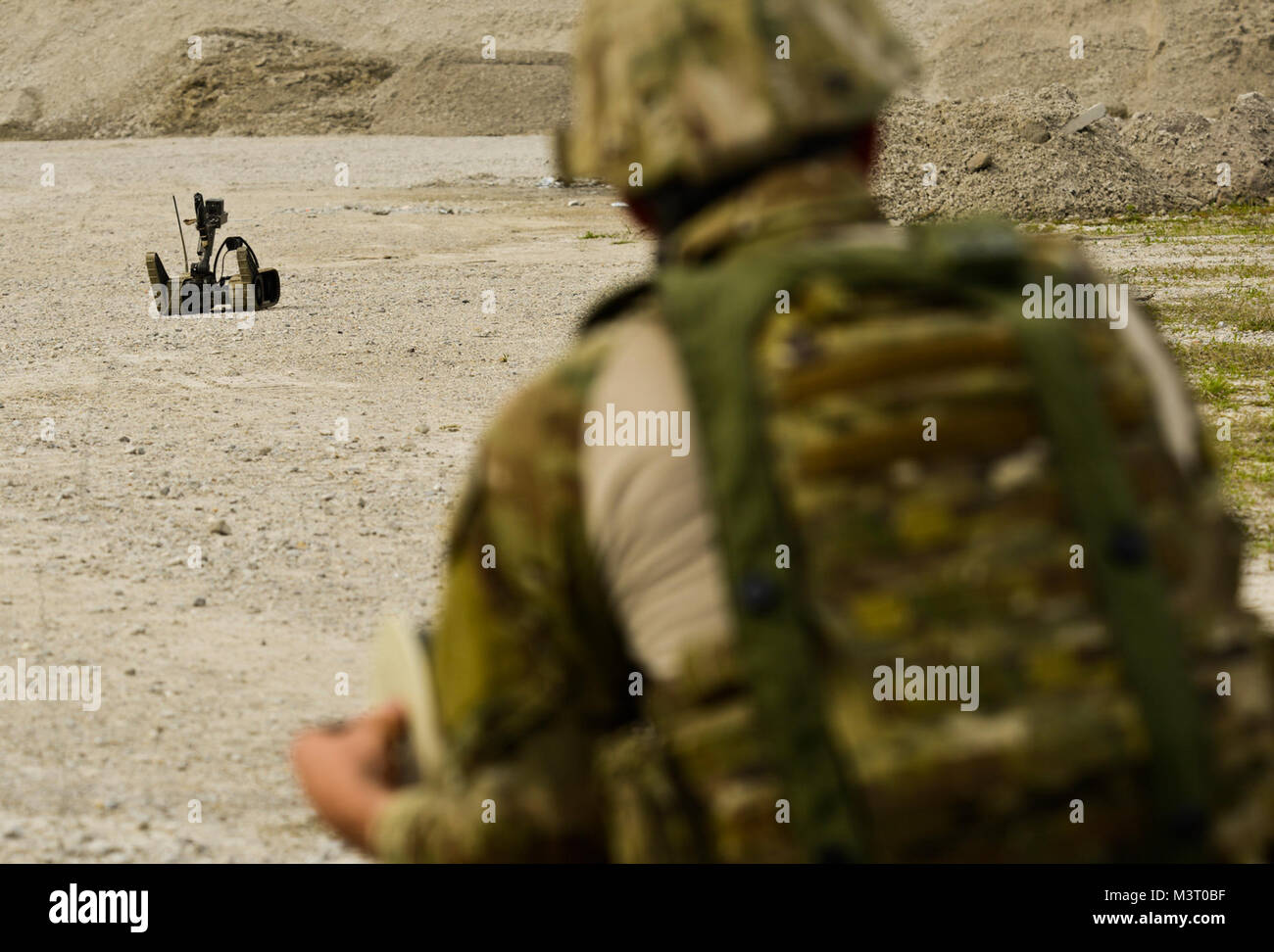 An iRobot 310 SUGV, Small Unmanned Ground Vehicle, is deployed carrying ...