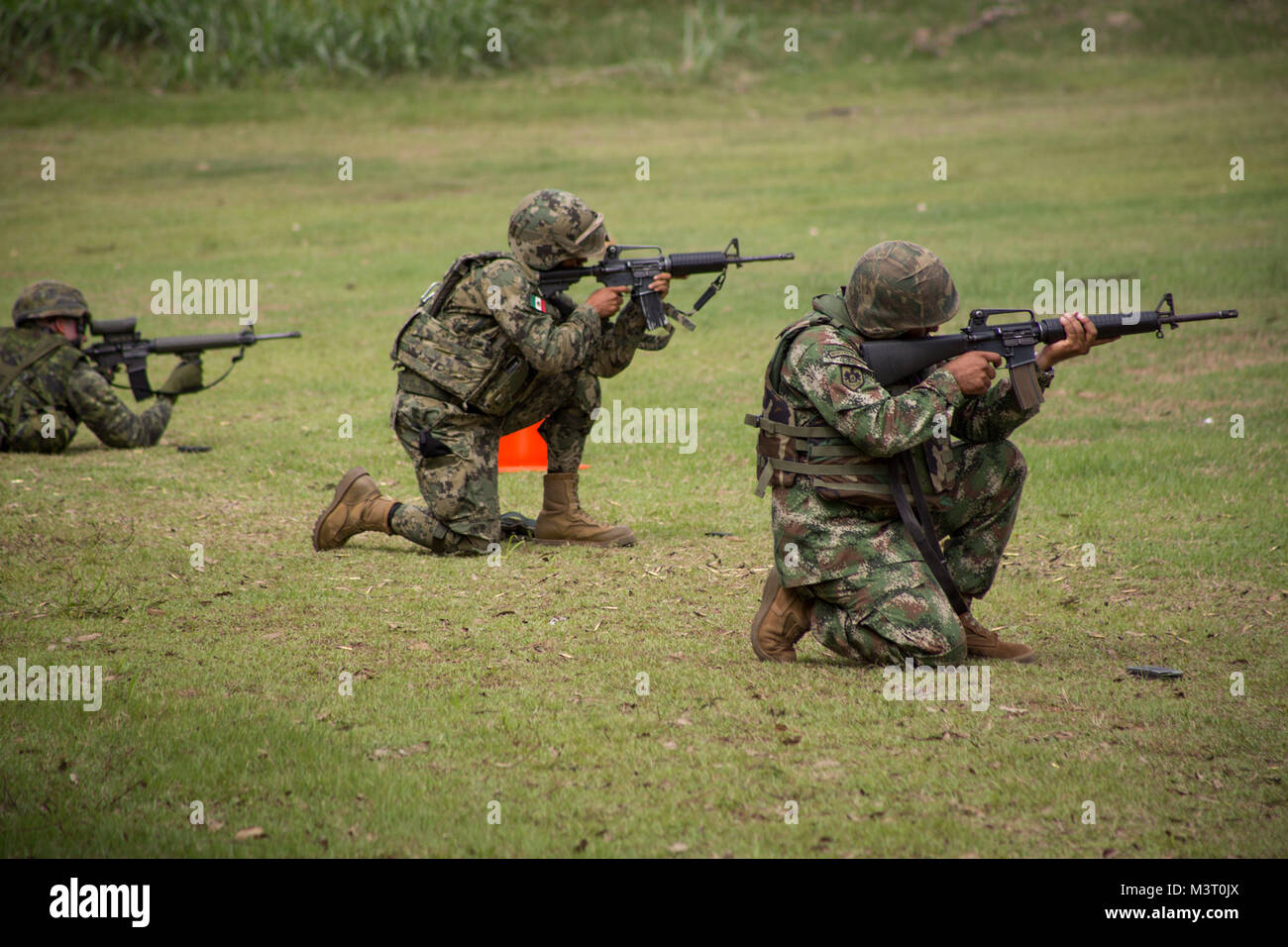 Partner nations engage targets with their M-16 service rifles and M-4 ...