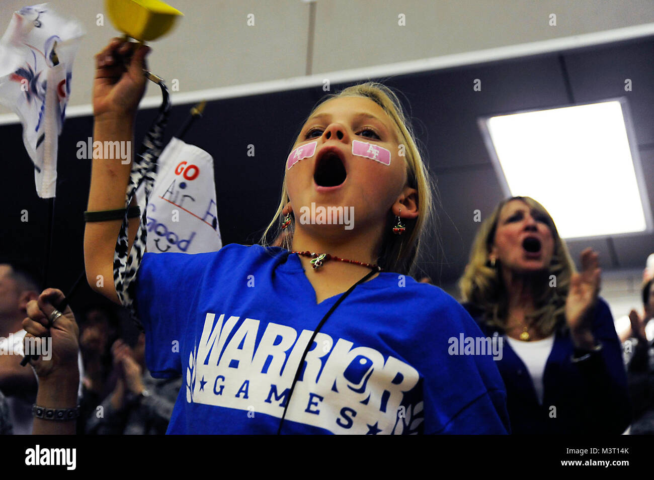 Nina Gestring cheers for her father Ken Gestring, during a sitting ...