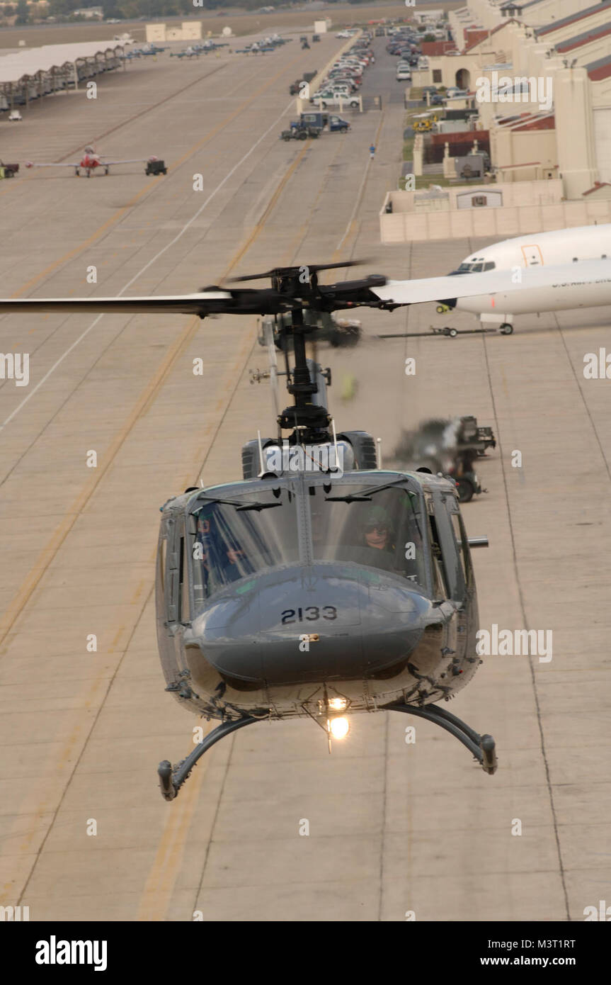 Capt. John Beurer (right seat) pilots the TH-1H trainer with Jeff ...
