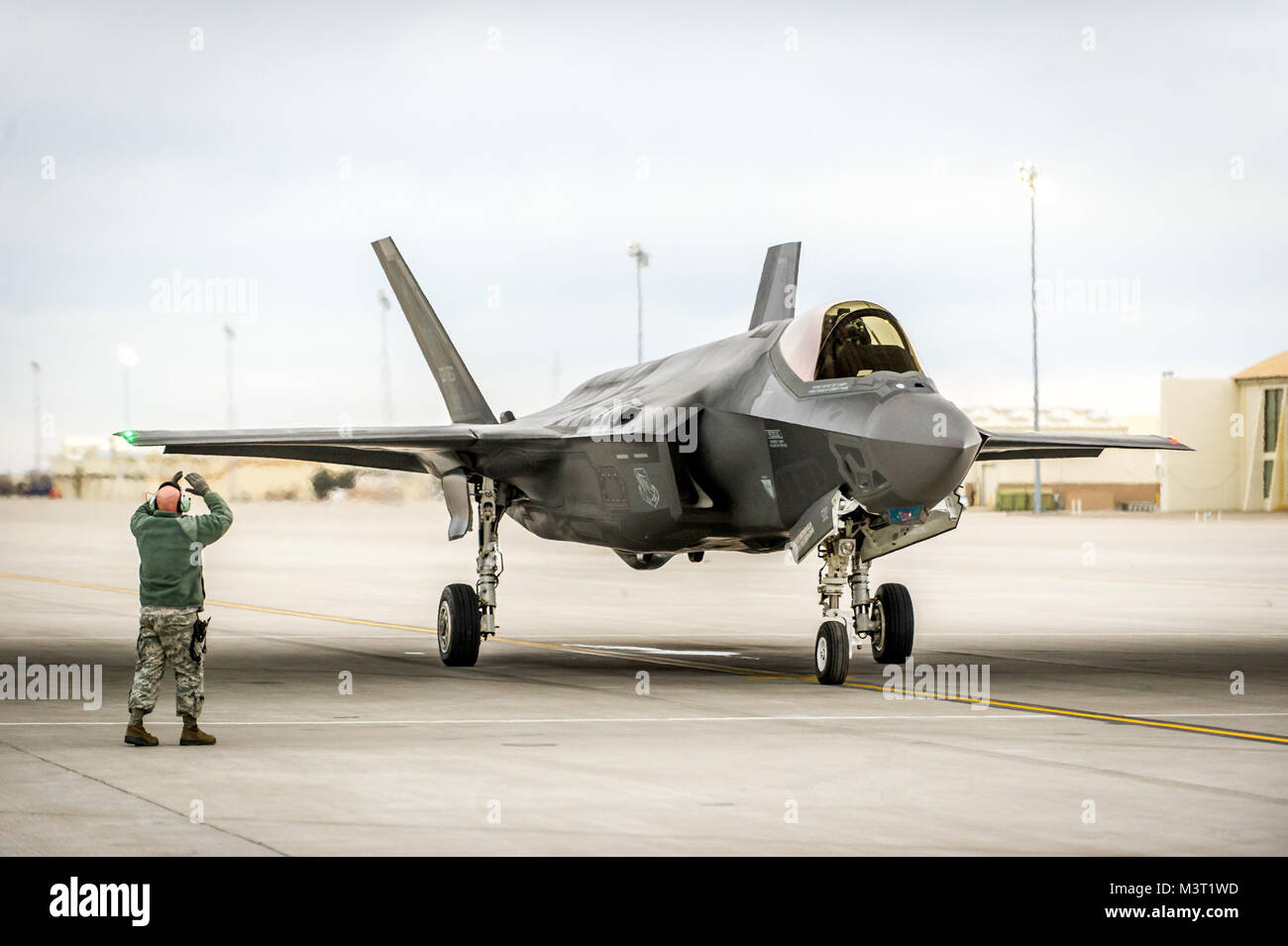 Maj. Garret Dover taxis to the runway in an F-35A of the 31st Test and ...