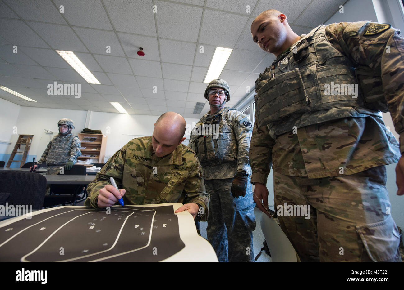 U.S. Army SGT Charles Porter, a military broadcaster, counts his hits ...