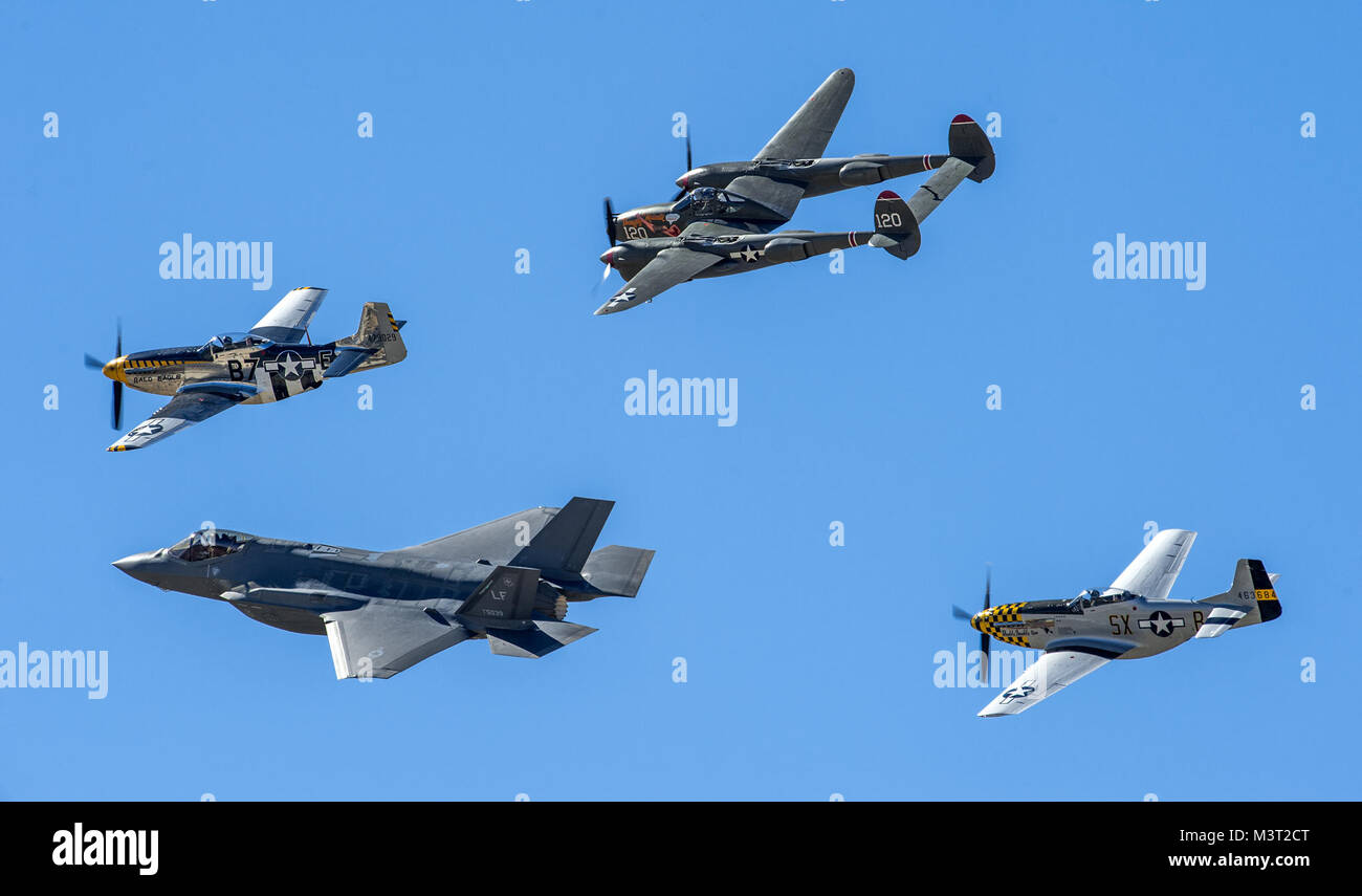 Two P-51D "Mustangs" and a P-38 "Lightning" fly formation with an F-35 ...