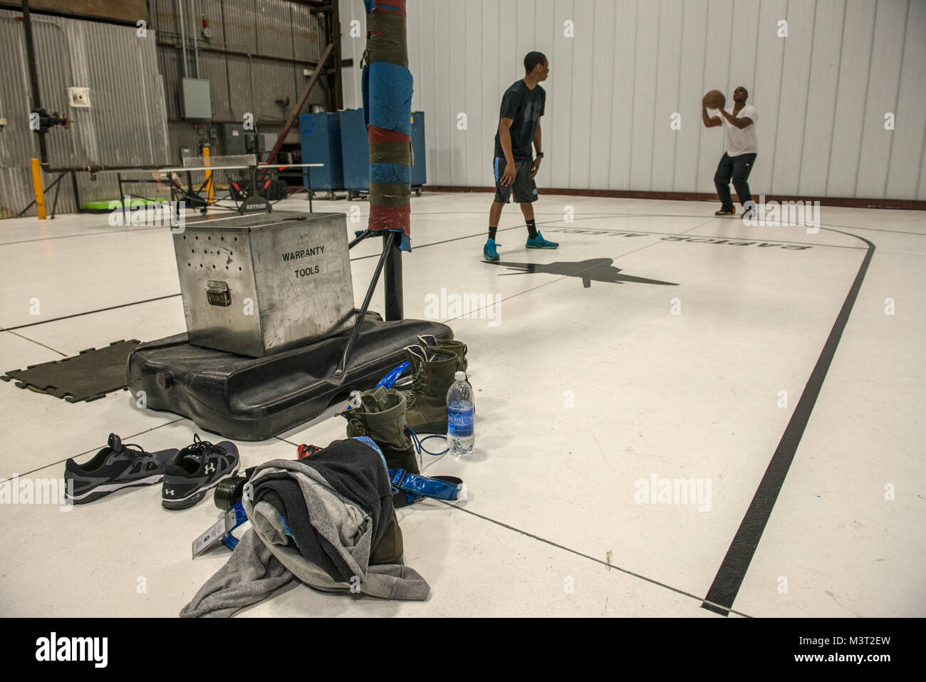 Staff Sgt. Marcel Ford, front, and Airman 1st Class Avian Sharpe play ...