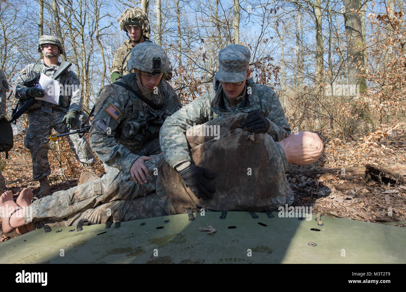 U.S. Army Sergeant Ethan Hawkinson (left), an infantry soldier and EFMB ...