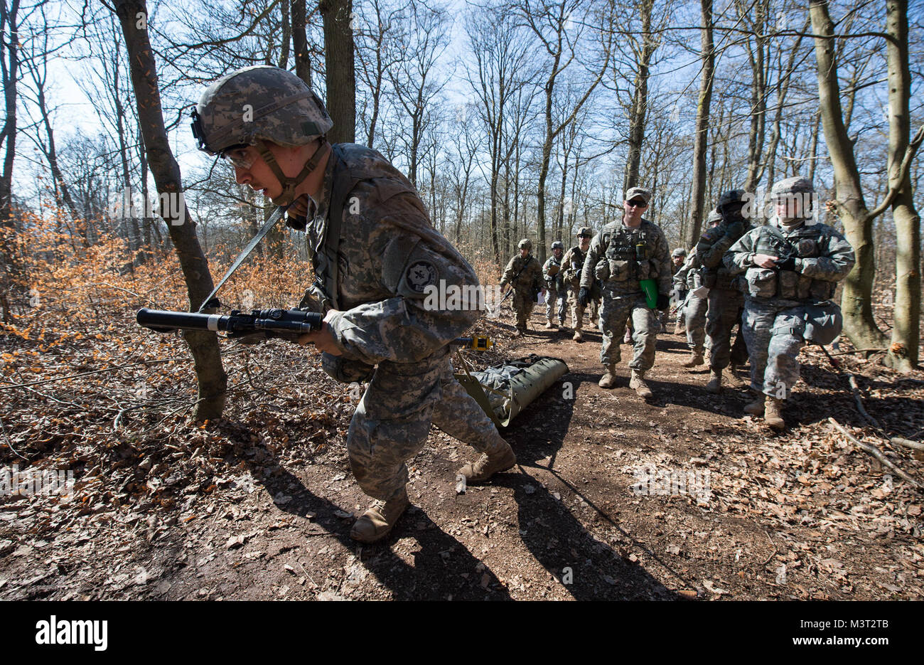 U.S. Army Sergeant Ethan Hawkinson (left), an infantry soldier and EFMB ...