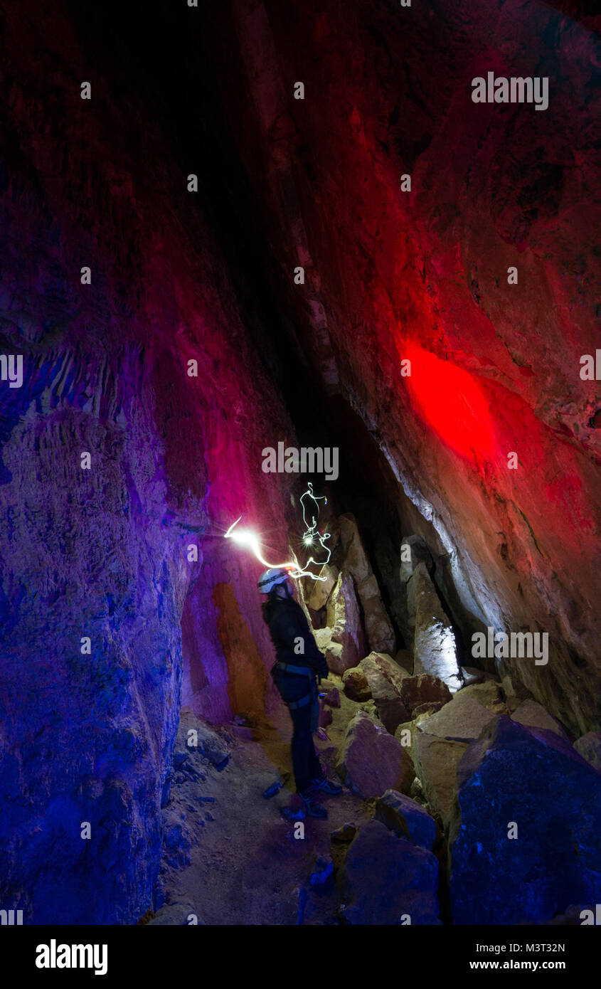 U.S. Air Force Staff Sergeant Thuy Lim and other adventurers maneuver ...