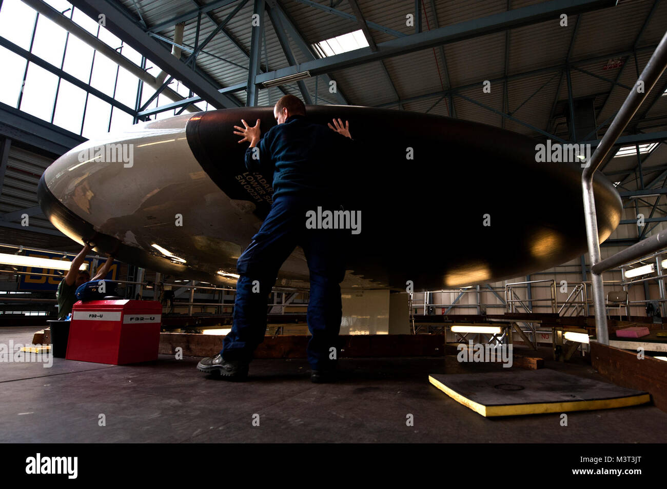 Staff Sgt. Michael Webb, a crew chief for the E-3 Sentry, works with ...