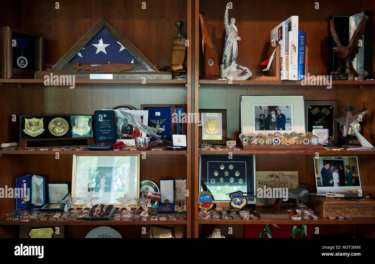 A bookshelf of mementos and honors testify to the 36 years that retired ...