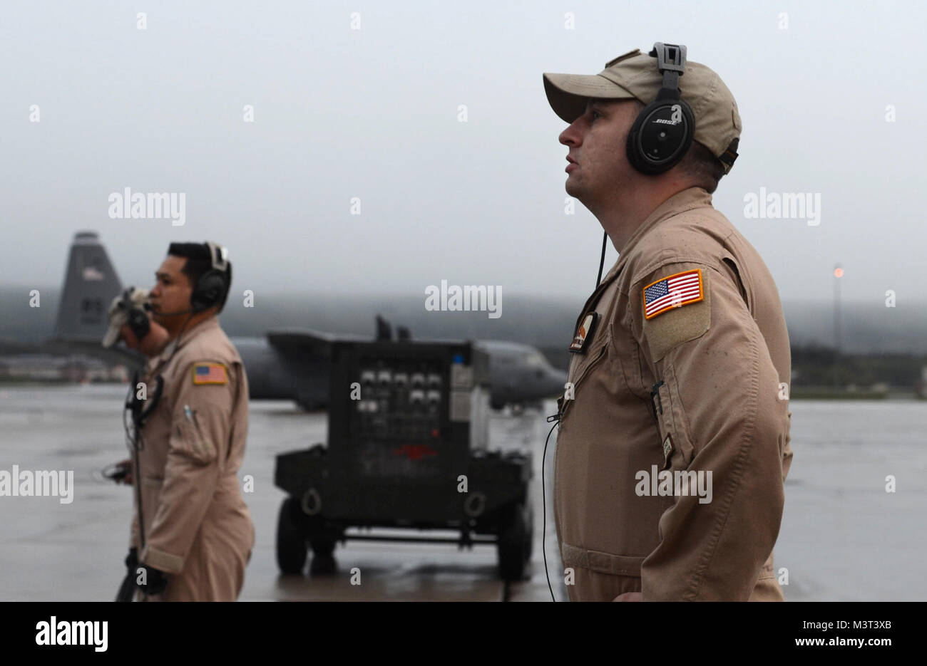 U.S. Air Force Technical Sergeant Matthew Miller (right), a crew chief ...