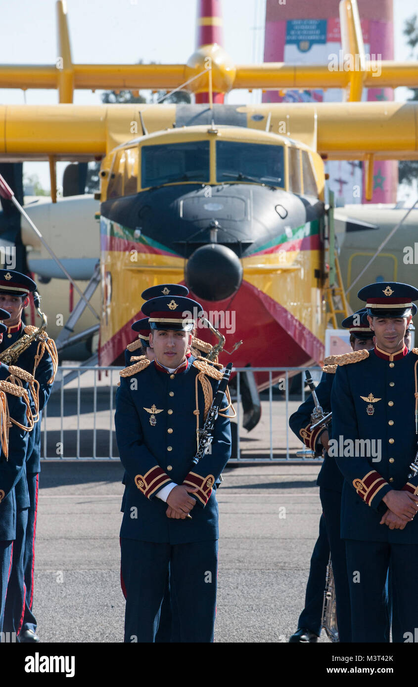Members of a Moroccan marching band stand in formation in preparation ...